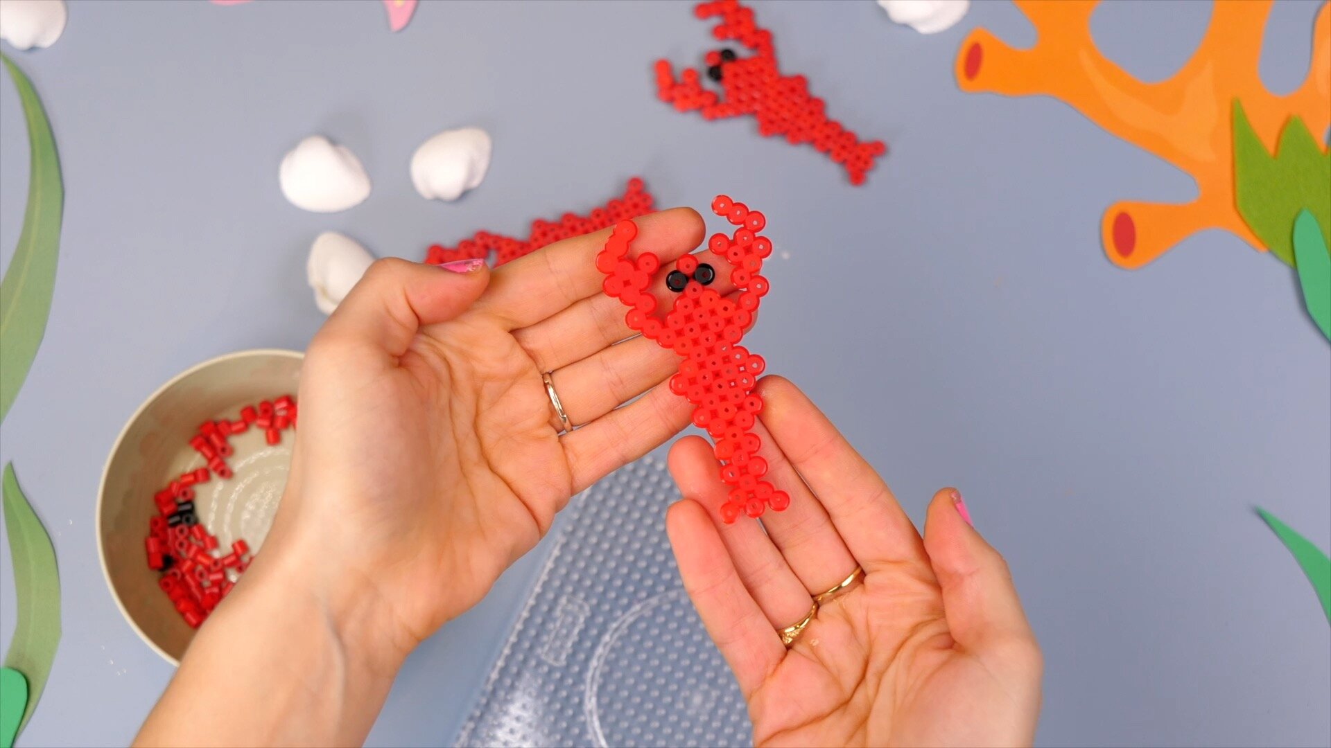 Lag en kreps av perler - Fiskesprell